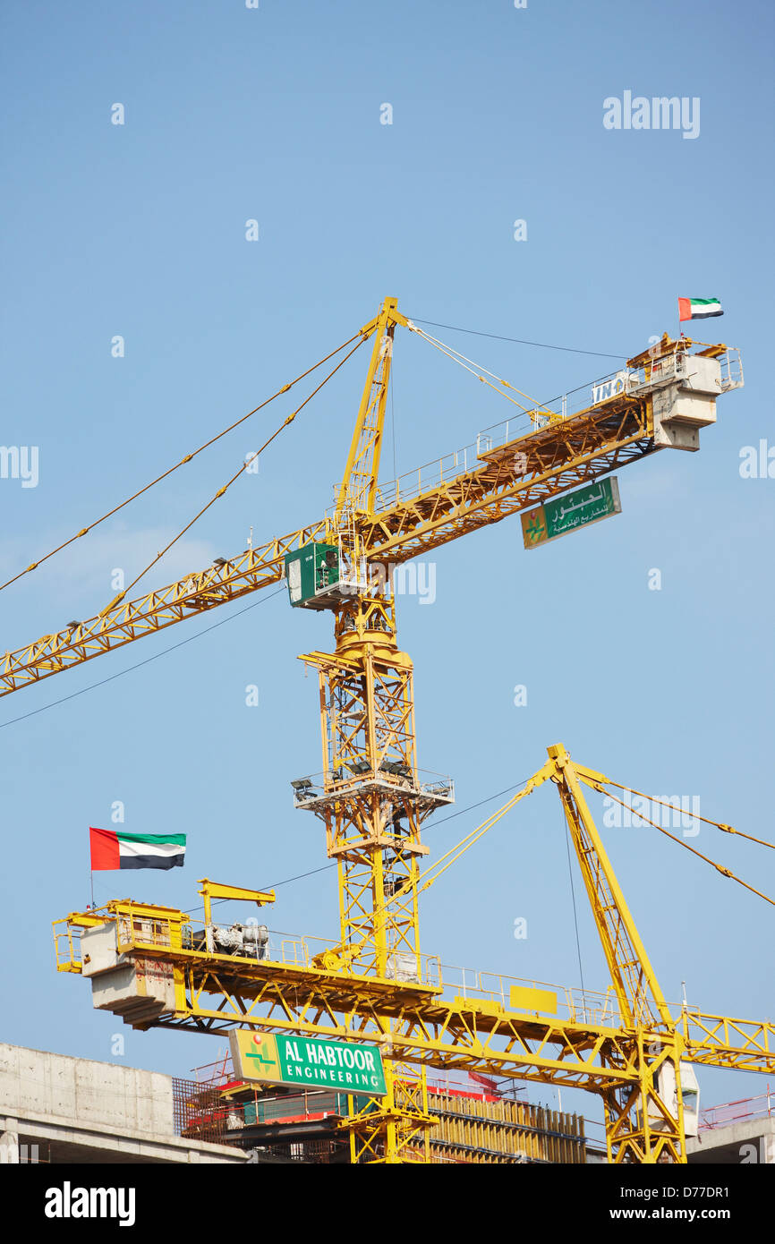 Massive construction crane atop high rise building Dubai United Arab ...