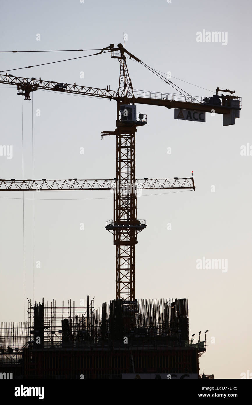 Massive construction crane atop high rise building Dubai United Arab ...