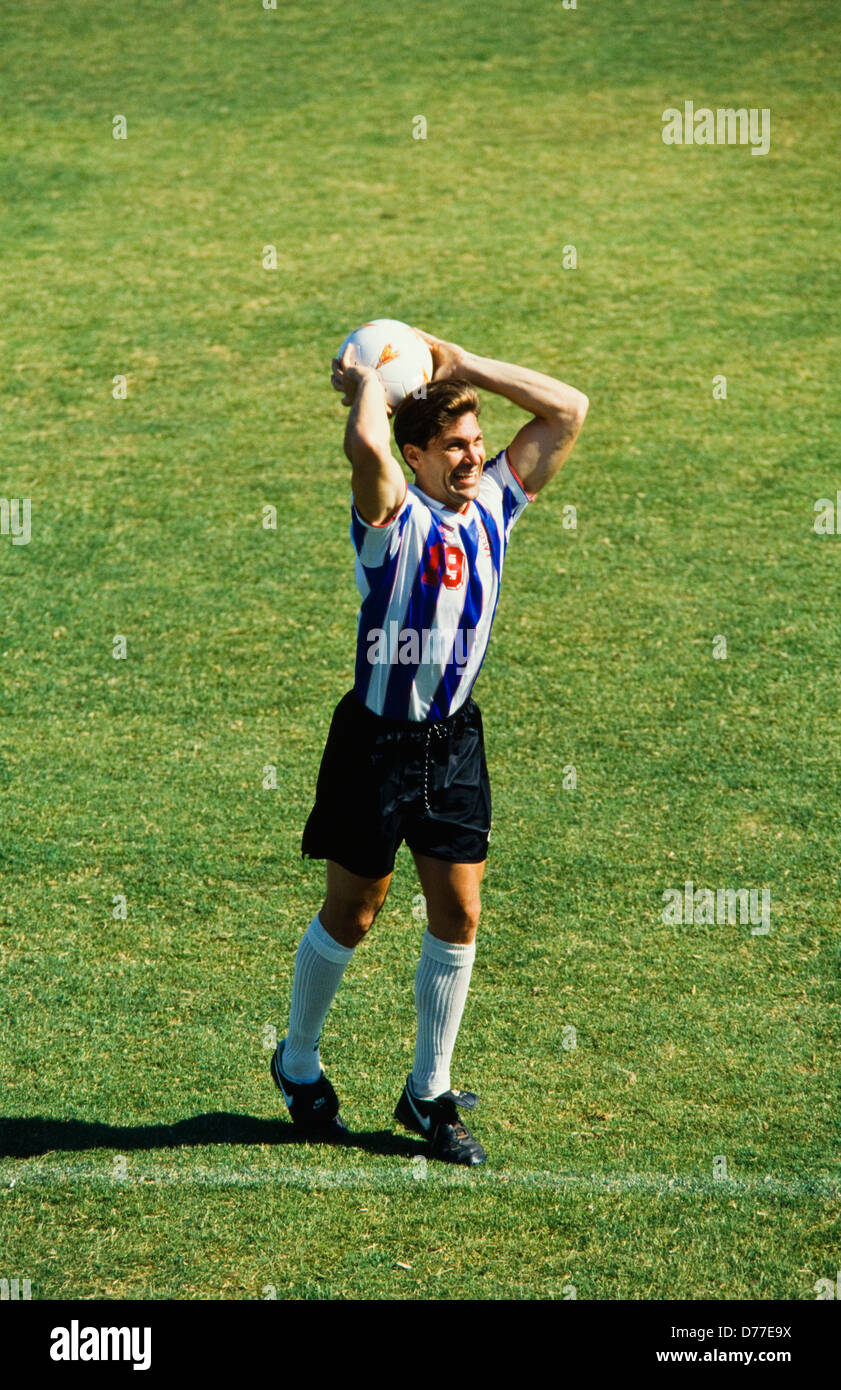 Soccer player alone with ball, throw in, Miami Stock Photo - Alamy