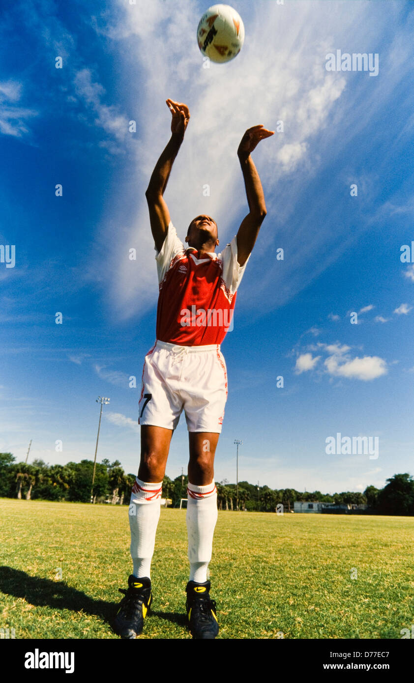 Soccer player alone with ball, throw in, Miami Stock Photo - Alamy