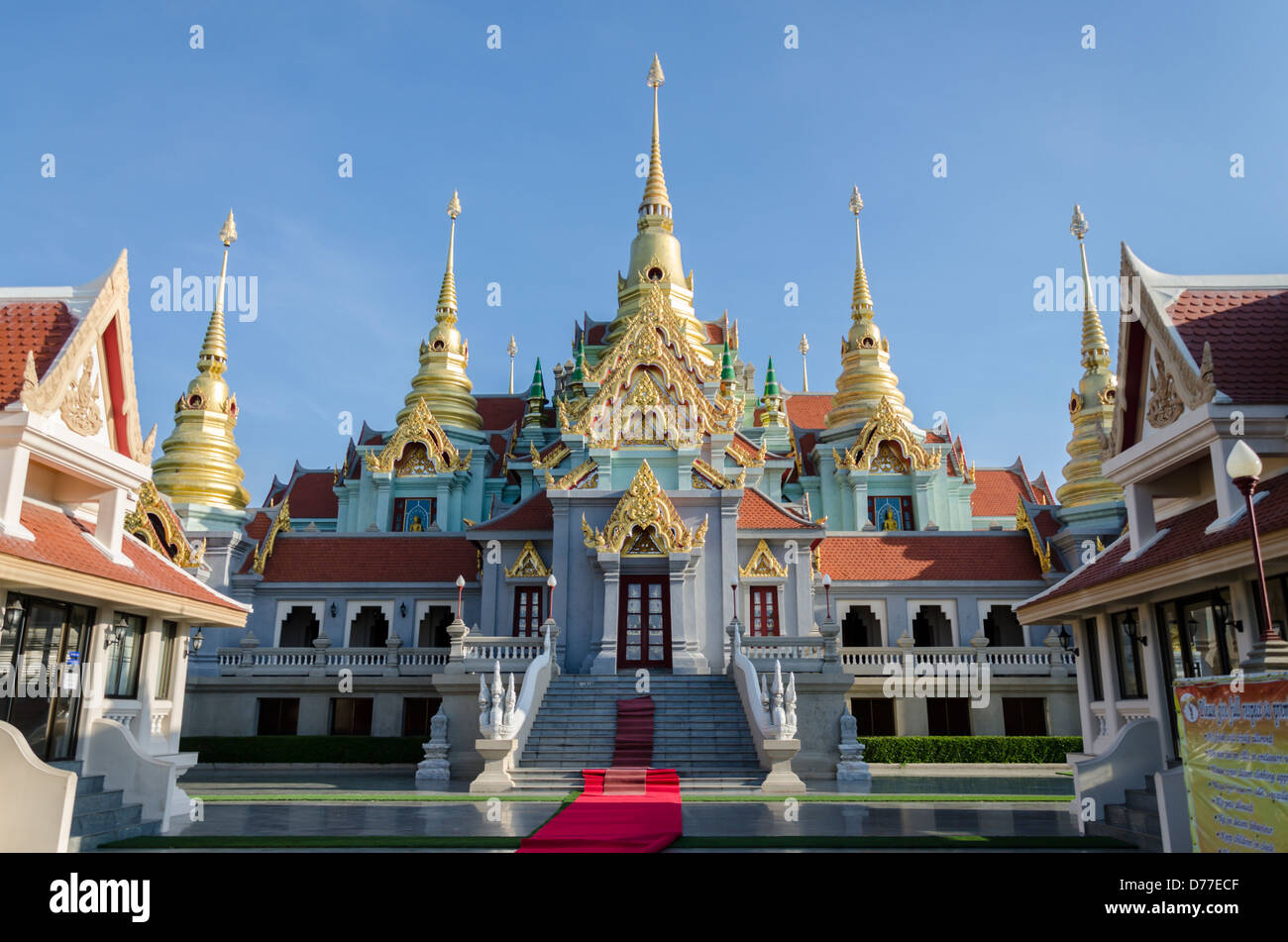 Golden spires of palatial Wat Tang Sai on top of Khao Tong Chai ...