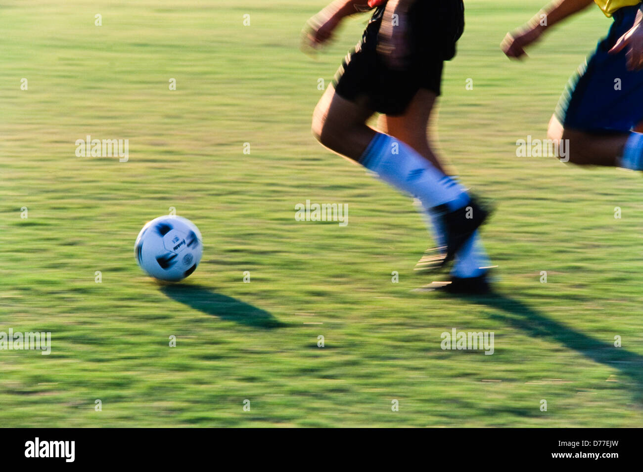 Soccer players in full run with ball, friendly competition, Miami Stock ...