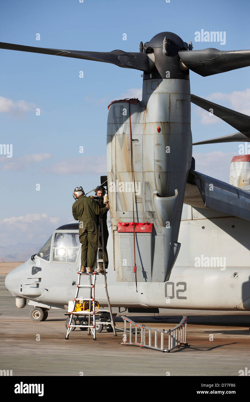 United States Marine Corps aircraft maintenance specialists working on ...