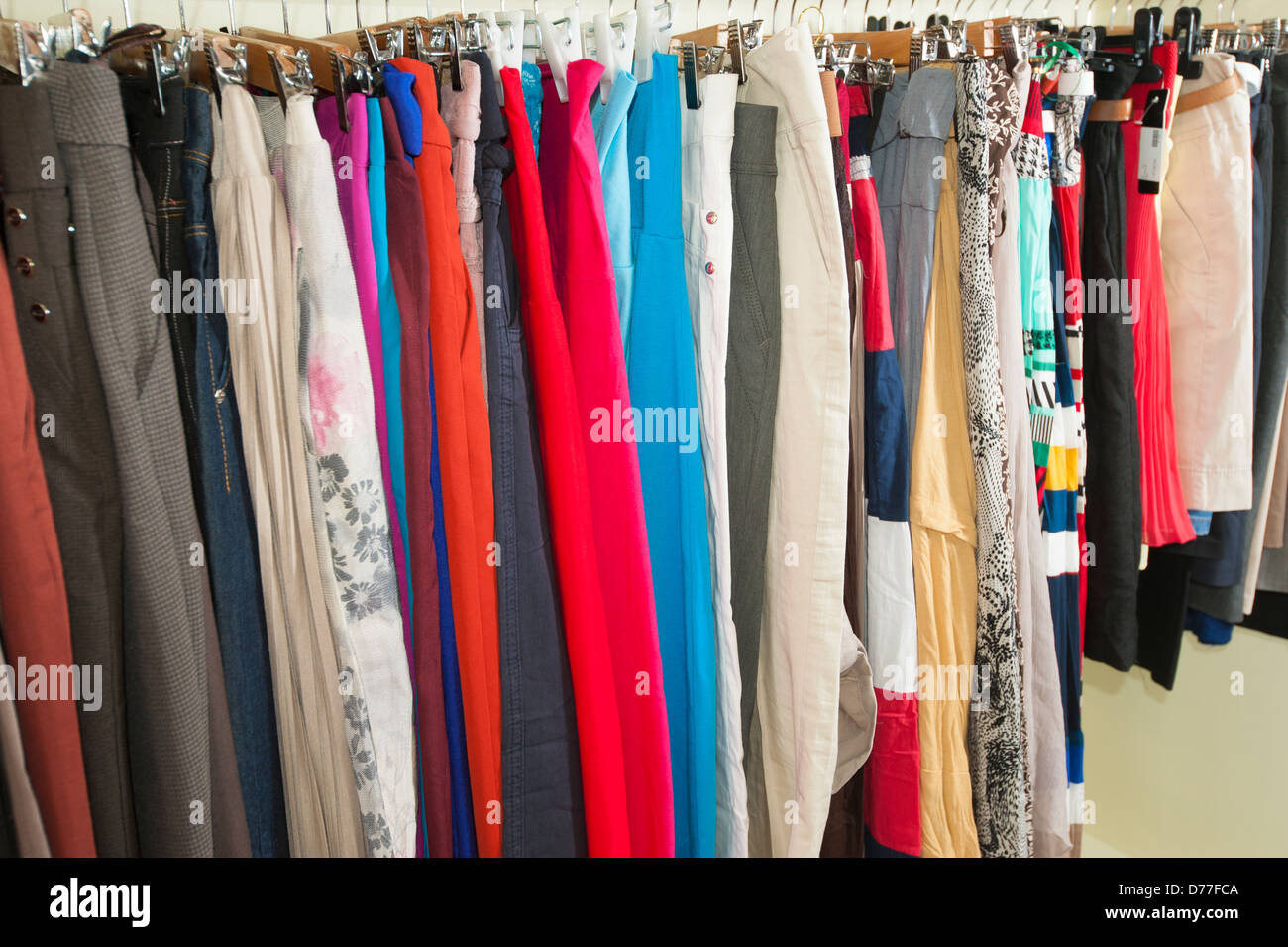 Colourful clothes clothing hangers hi-res stock photography and images ...