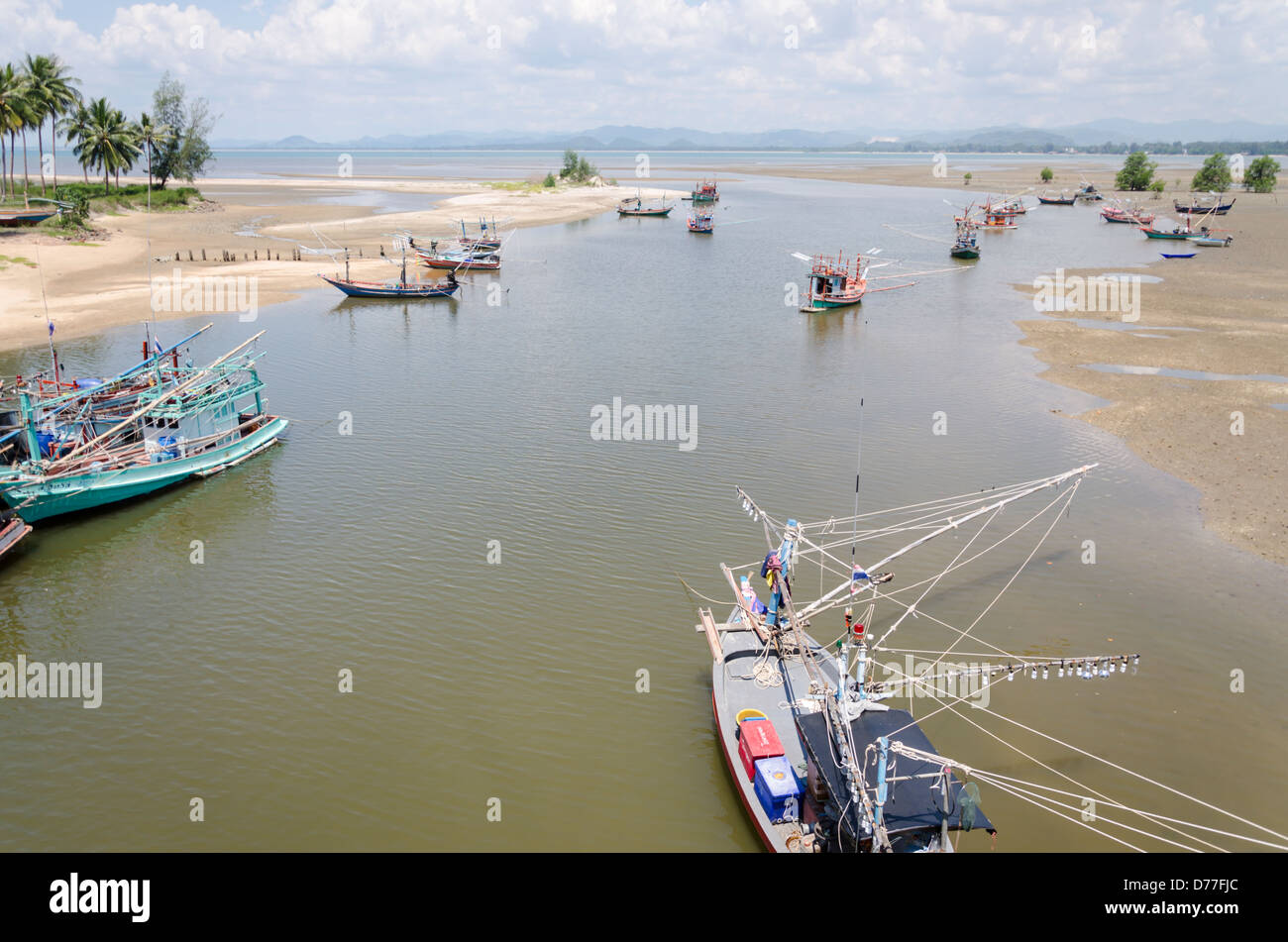 Fishing boats anchored at inlet by the sea in southern Thailand Stock ...