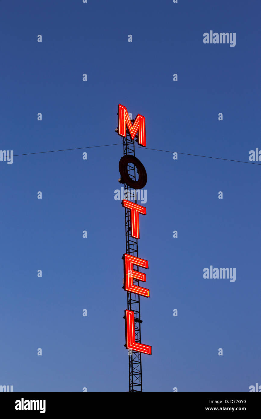 Neon sign at dusk Stock Photo - Alamy