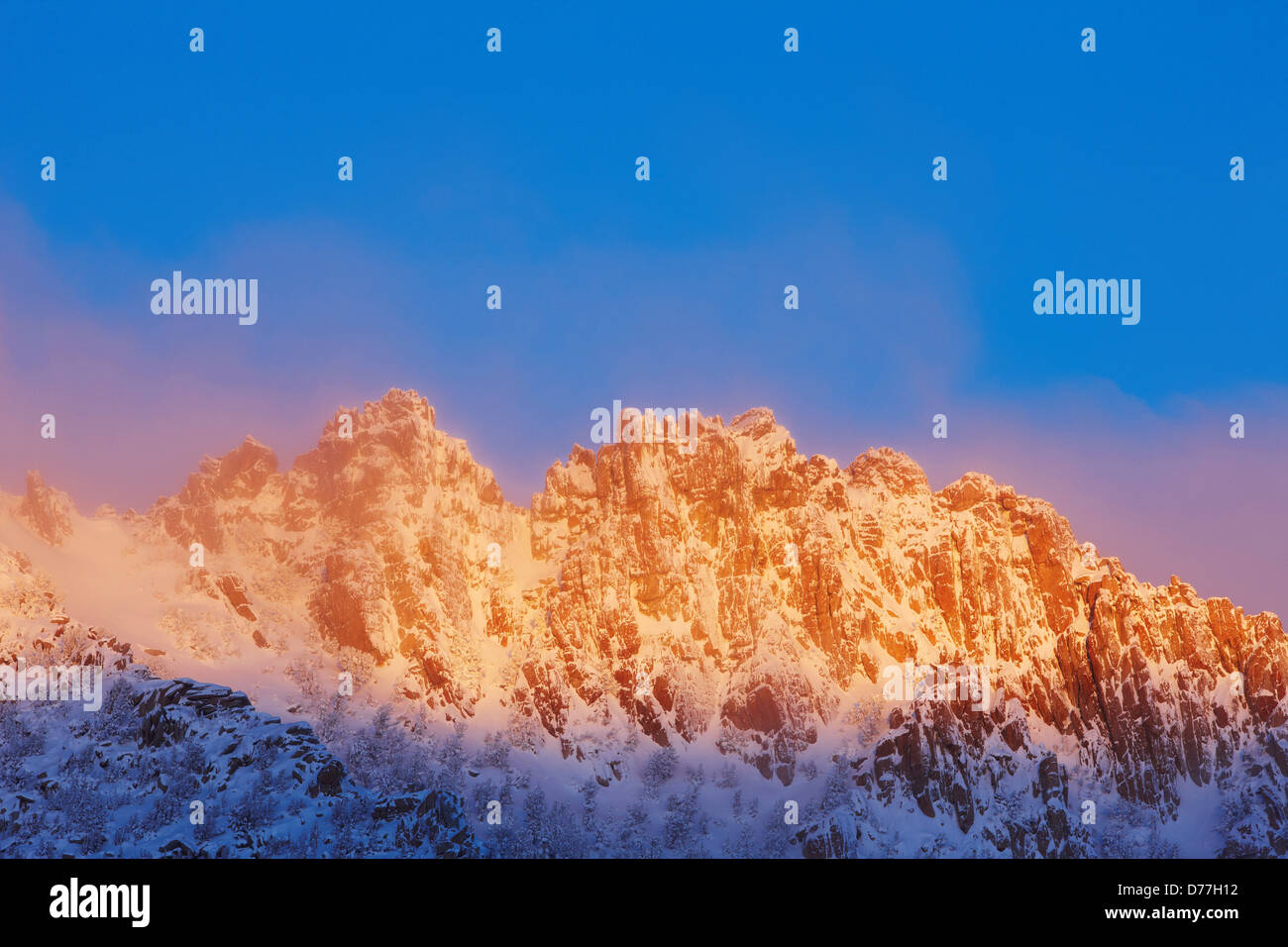 USA California Sierra Nevada Mountains Fiery alpenglow on upper slopes ...