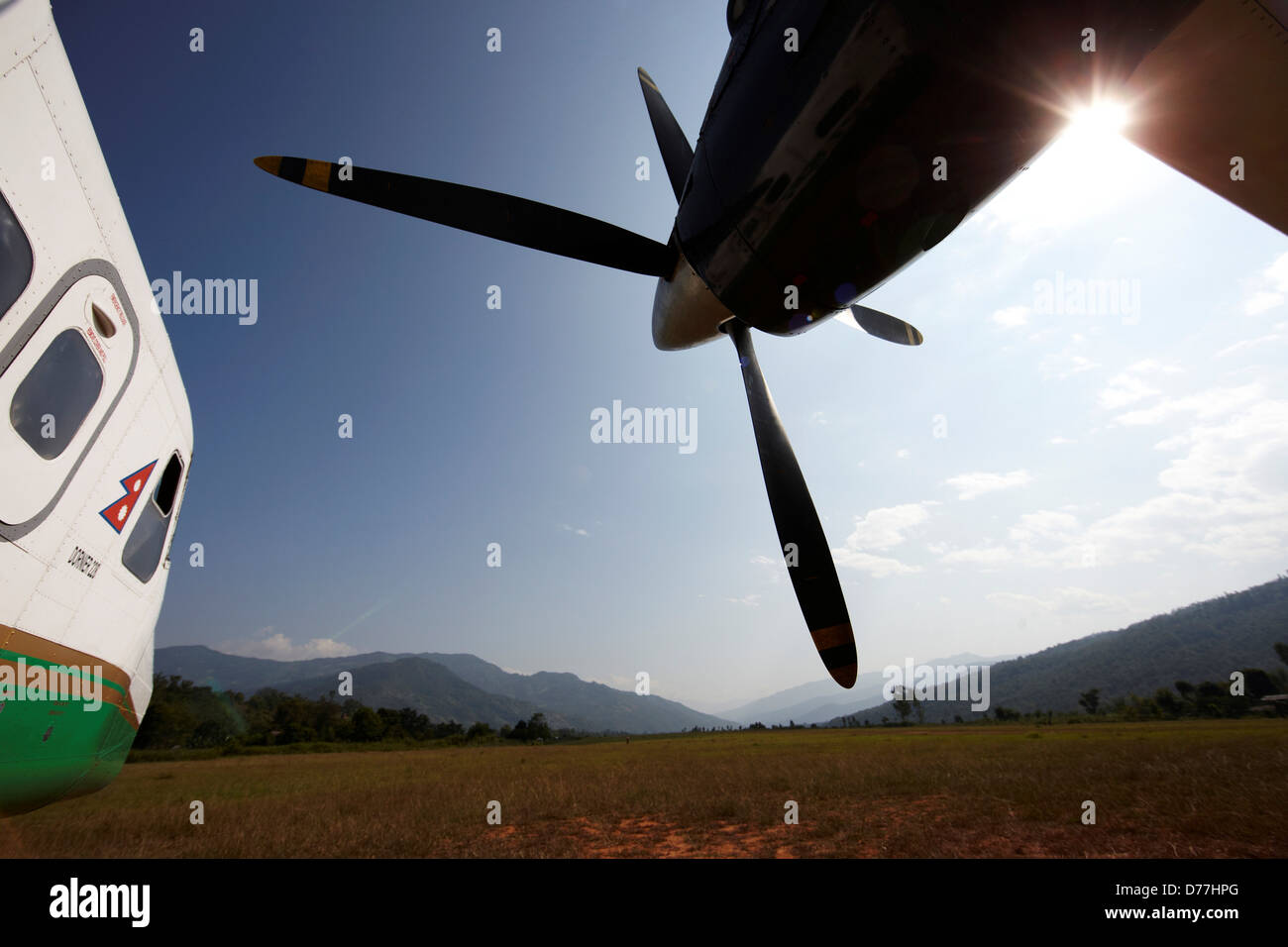 Nepal Himalaya Tumlingtar twin-turboprop passenger aircraft on dirt ...