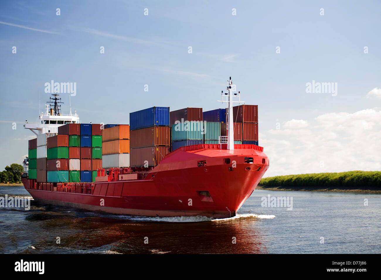 cargo container ship - freighter navigating river Stock Photo - Alamy
