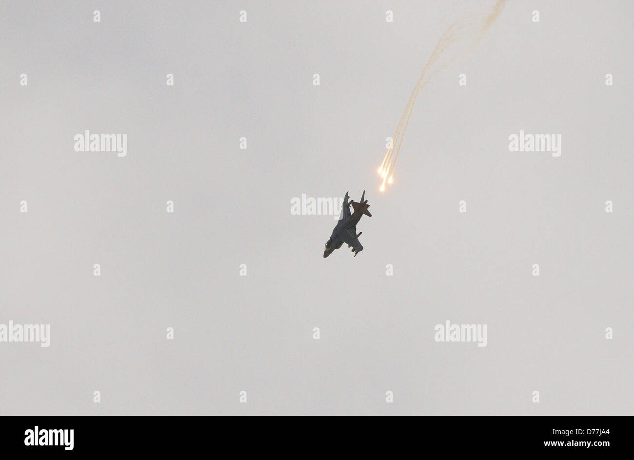 US Marine Corps AV-8B Harrier attack aircraft expends flares after ...