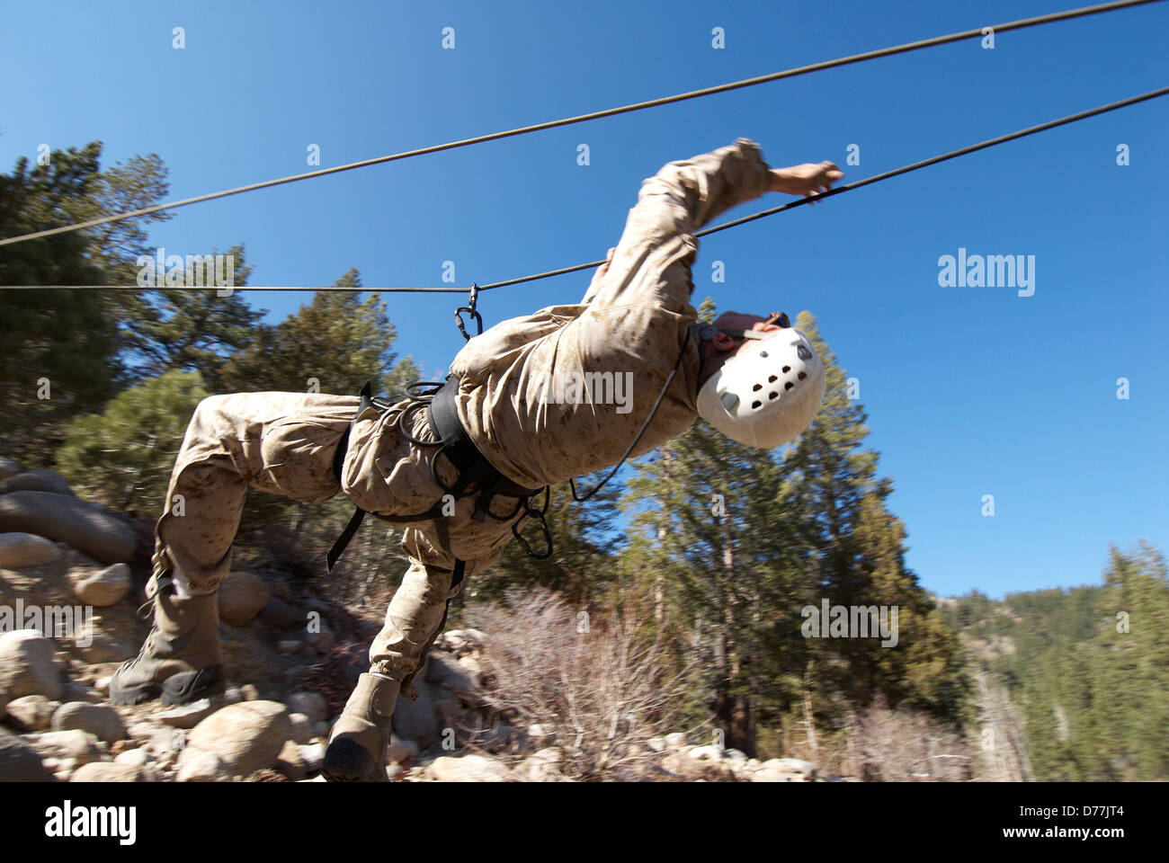 US Marine crosses river suspended by rope Marine Corps Mountain Warfare ...
