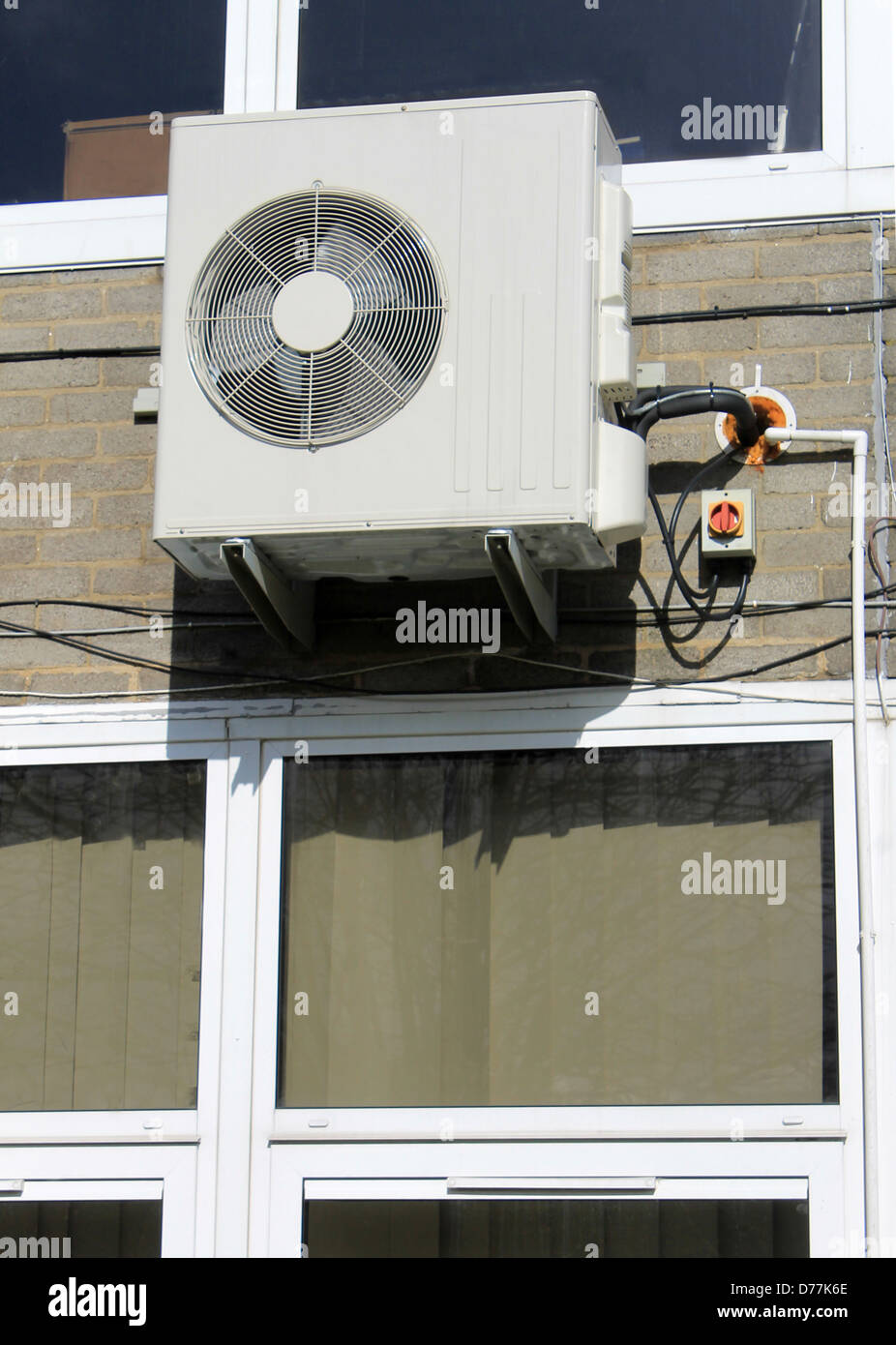 Industrial exractor fan on exterior of modern school building Stock ...
