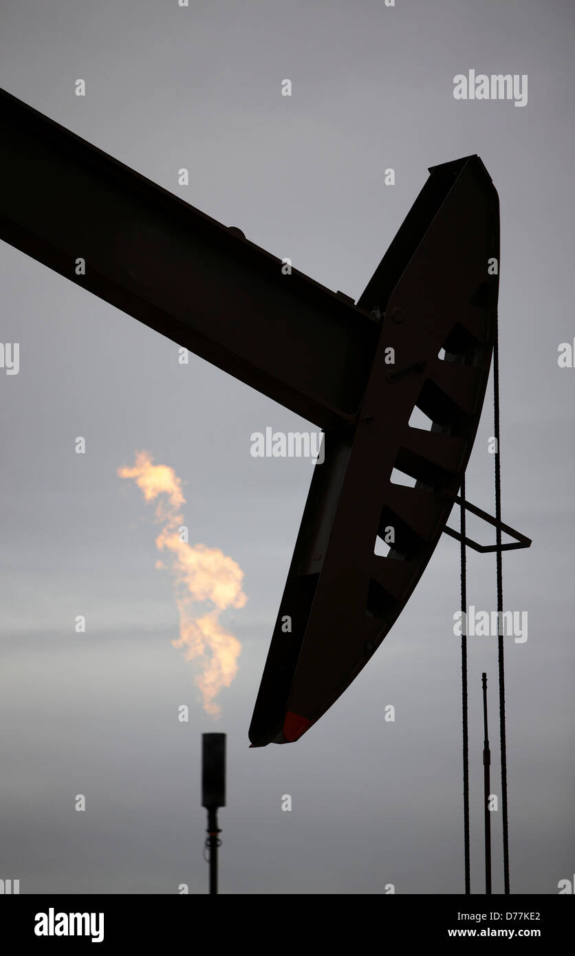 USA Colorado Oil well pumpjack flaring tower Stock Photo - Alamy