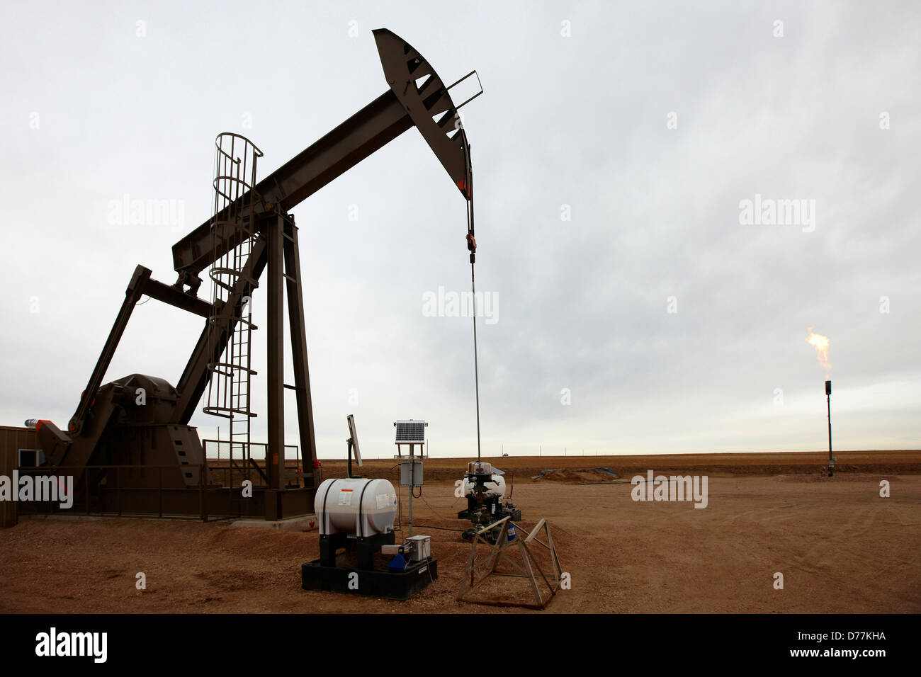 USA Colorado Oil well pumpjack flaring tower Stock Photo - Alamy