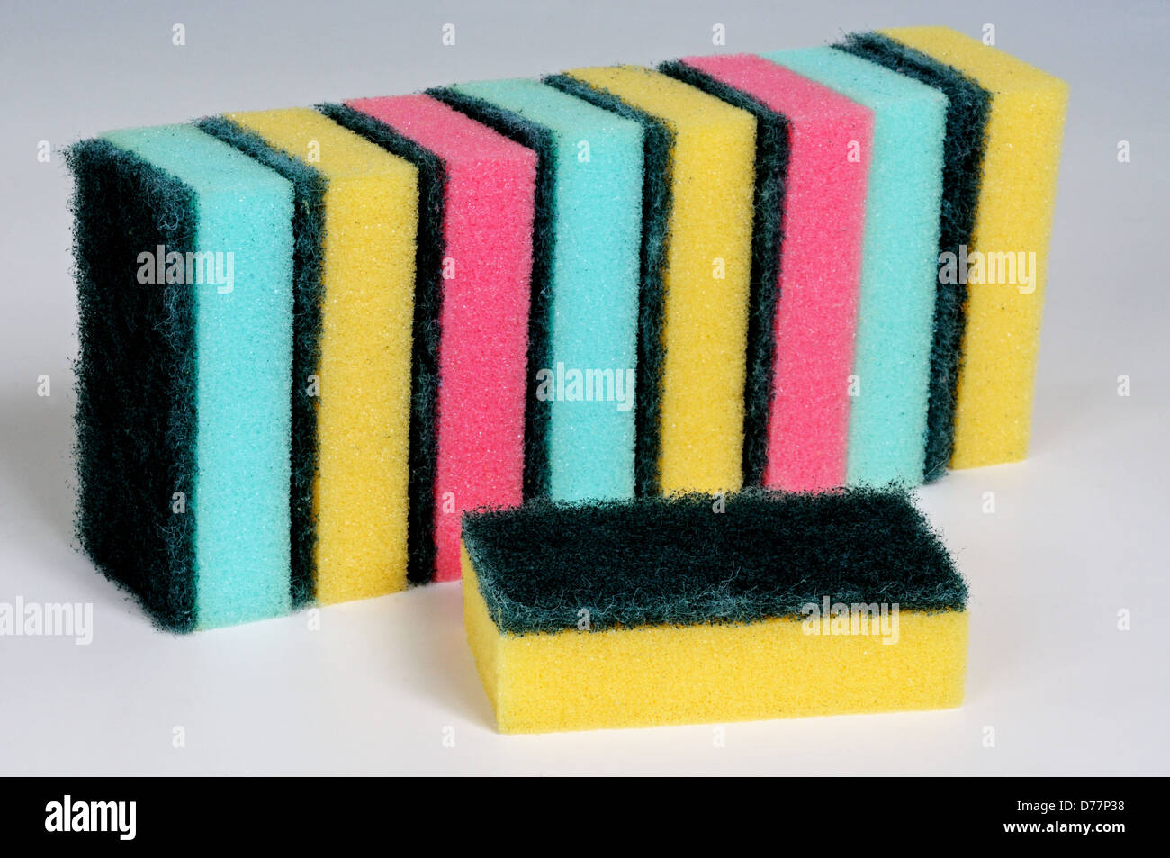 Sponge scourers against a grey background Stock Photo - Alamy