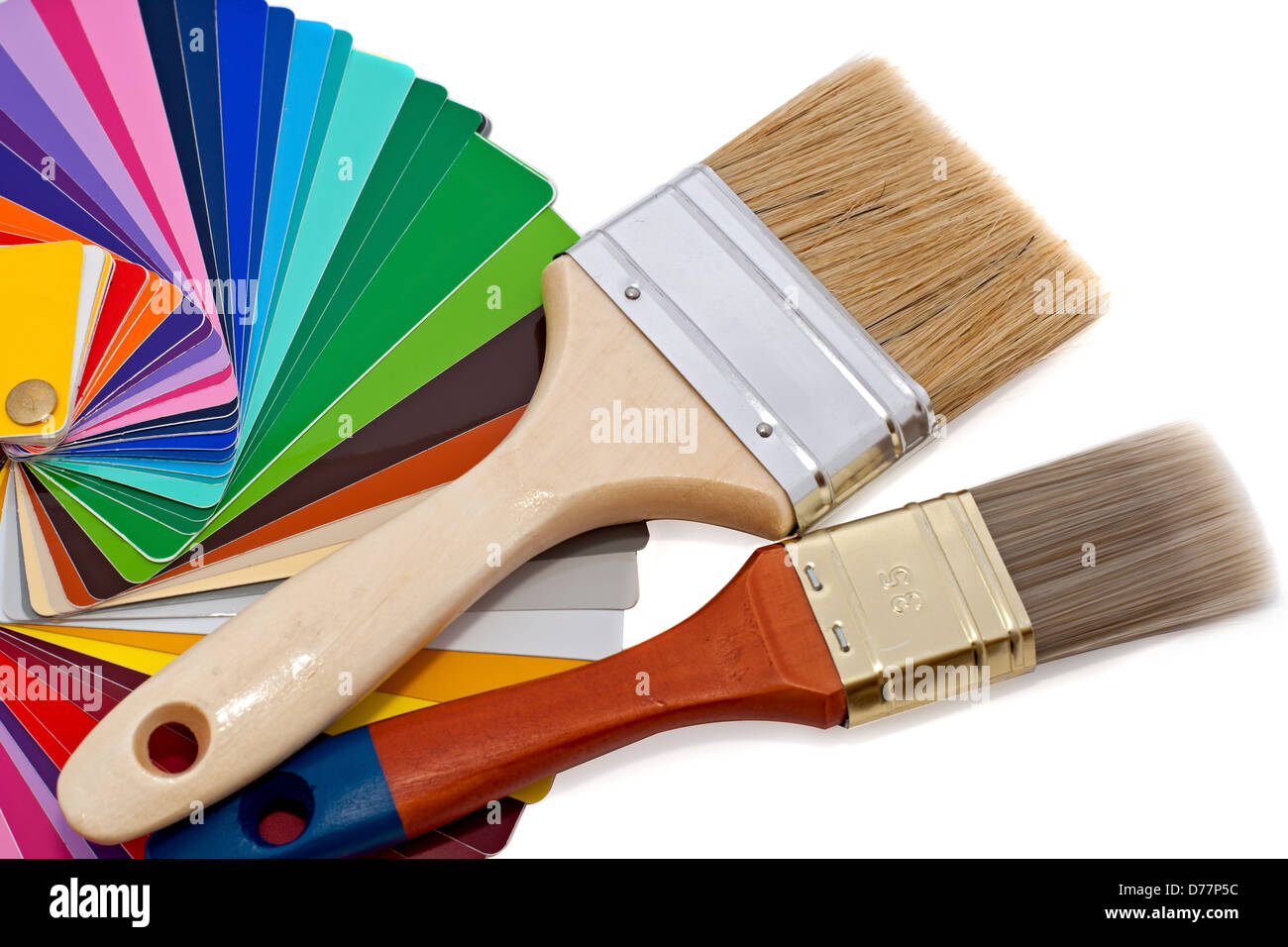 paintbrushes and color samples over white background Stock Photo - Alamy