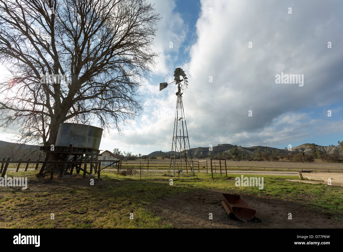 Windmill and tank Stock Photo - Alamy