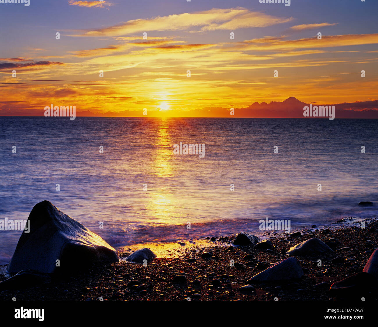 Sunset over Cook Inlet Iliamna Volcano in Lake Clark National Park on ...
