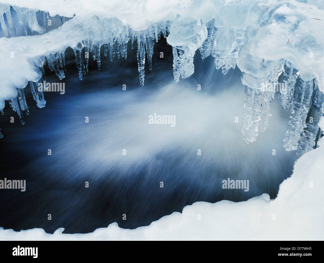 Hole in ice covering creek above Rainbow Falls Wrangell Island ...