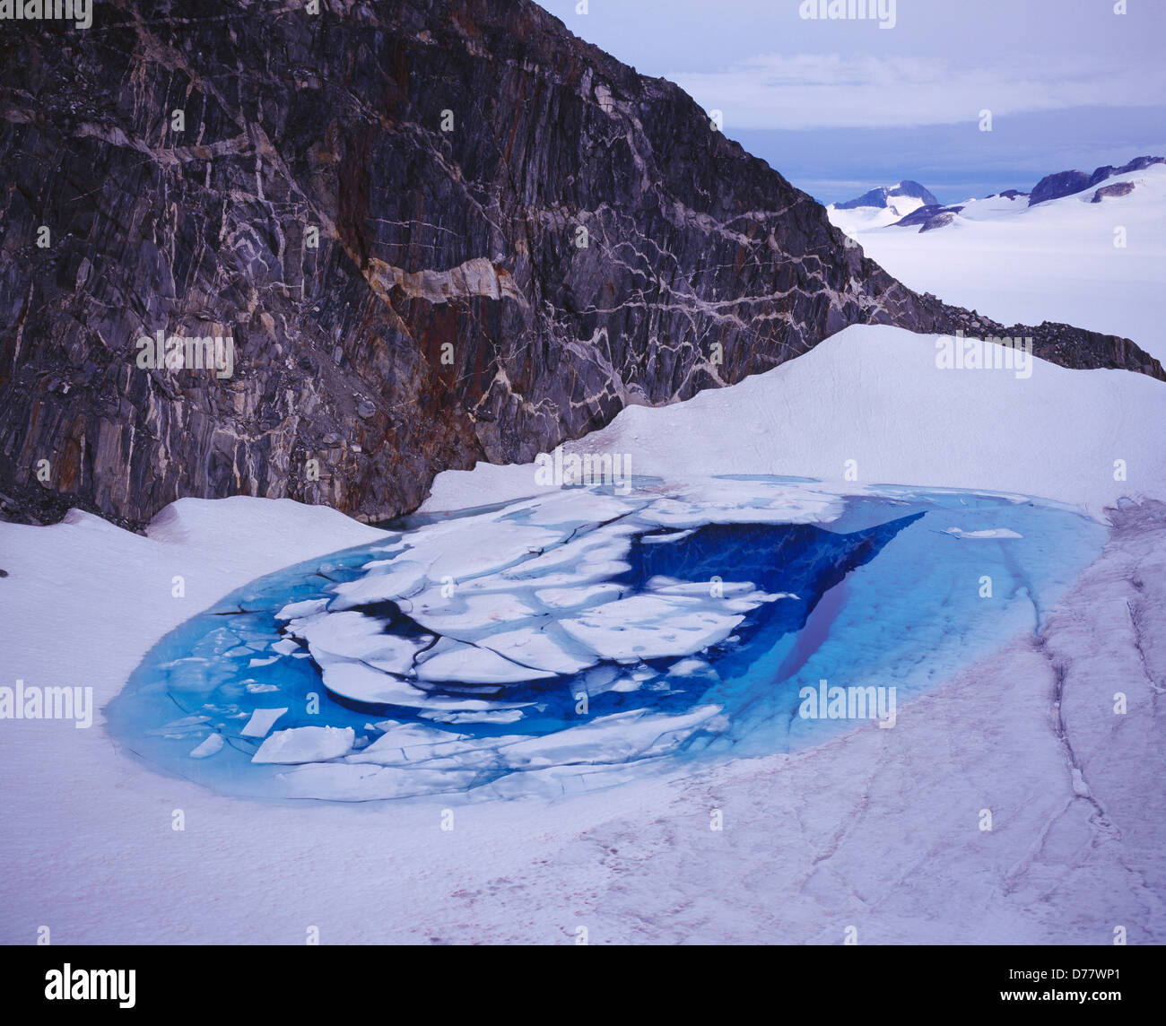 Deep blue glacial melt water pool by Echo Mountain Juneau Icefield ...