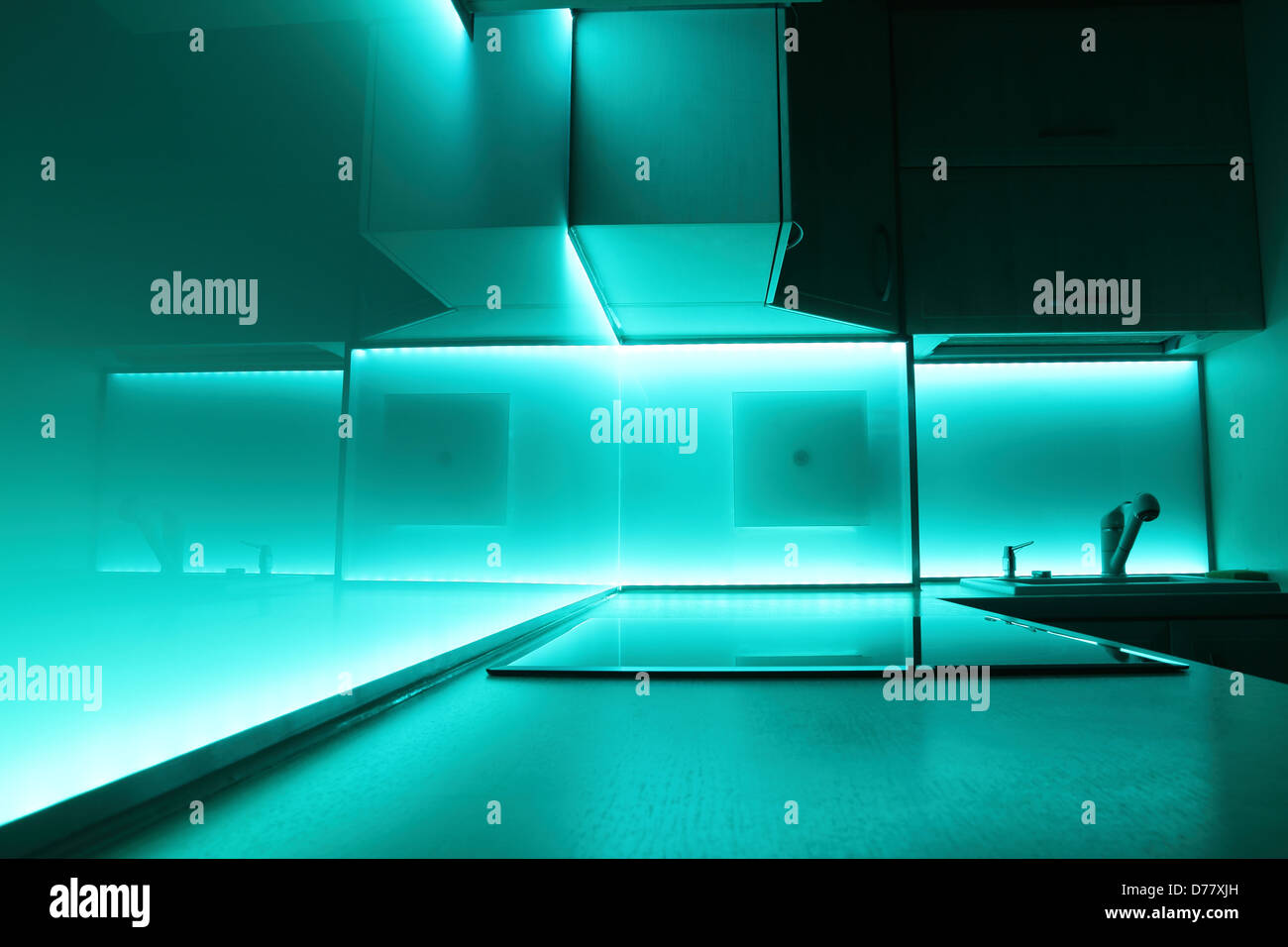 modern luxury kitchen with turquoise led lighting Stock Photo - Alamy