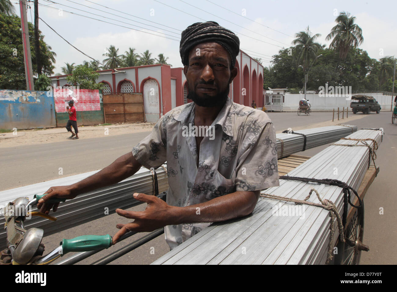 Dhaka, Bangladesh. May 1, 2013. A Bangladeshi day labor worker during ...