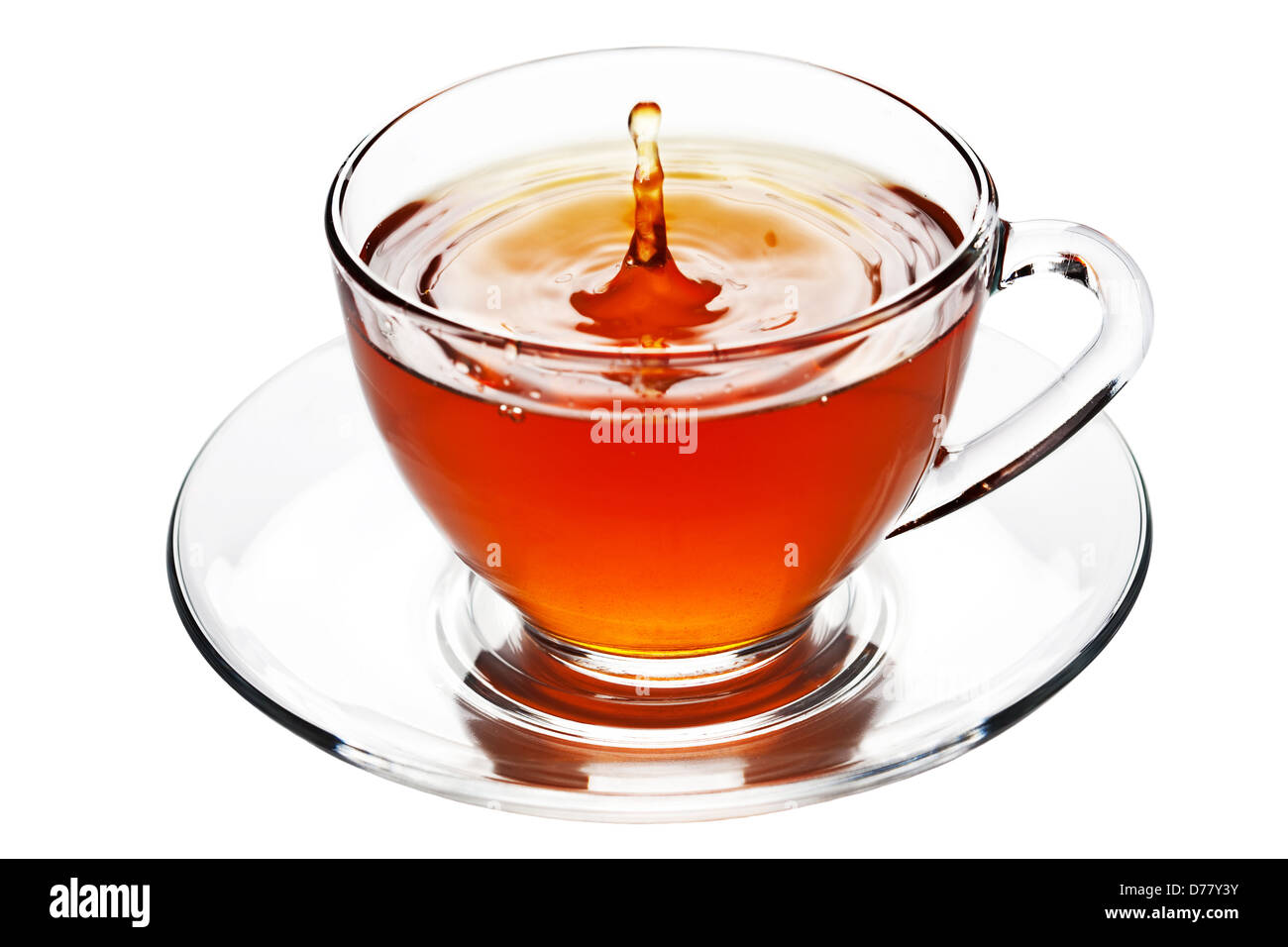 tea splash in glass cup isolated Stock Photo - Alamy