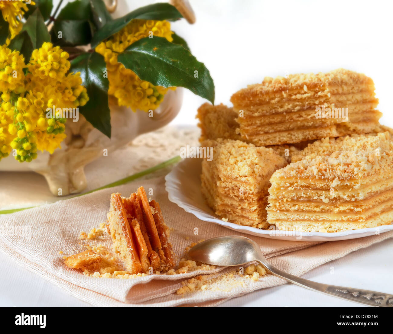 still life with yellow flowers and a cake Stock Photo - Alamy