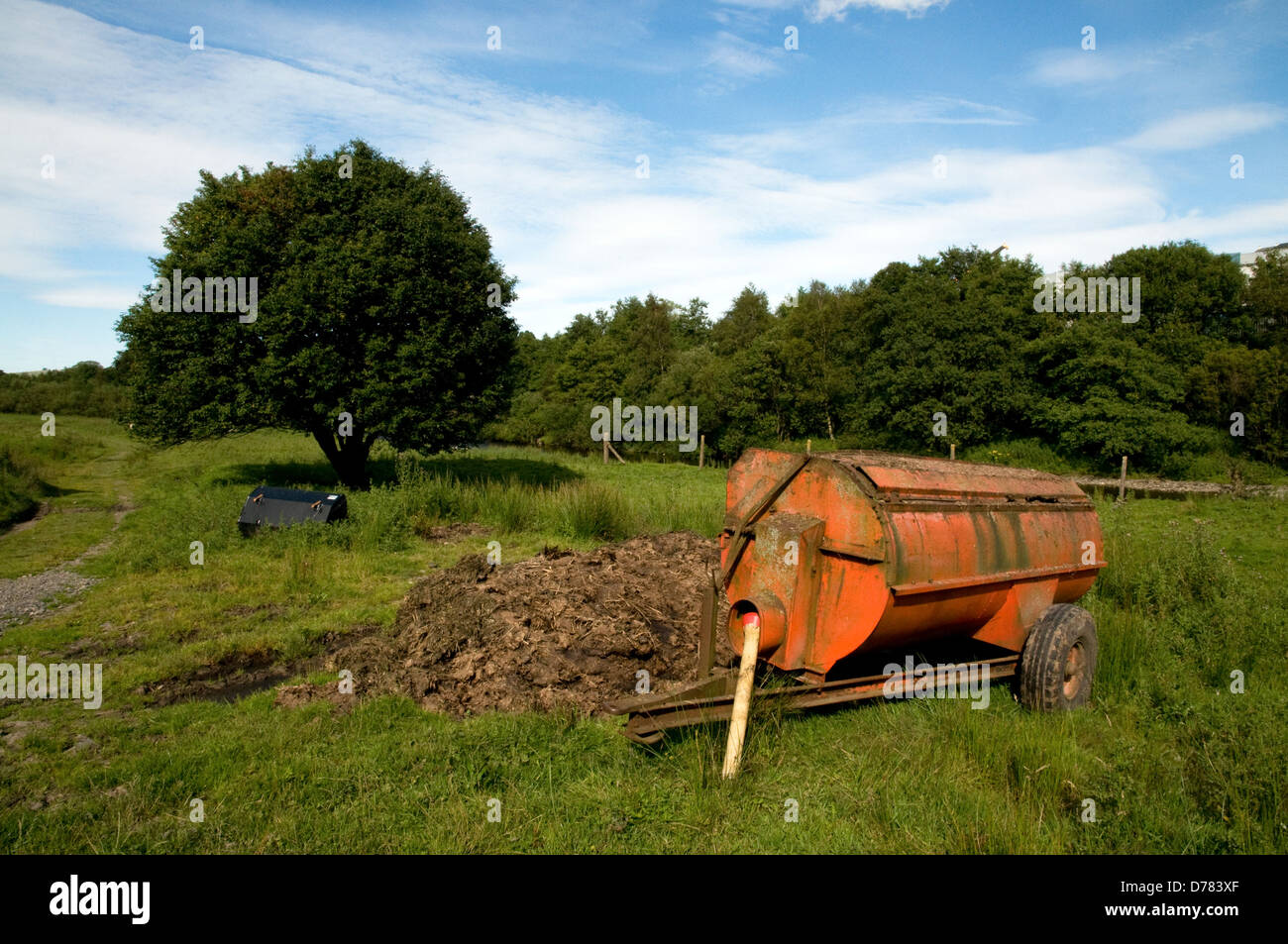 muck spreading machine,farmland,tebay,cumbria Stock Photo - Alamy