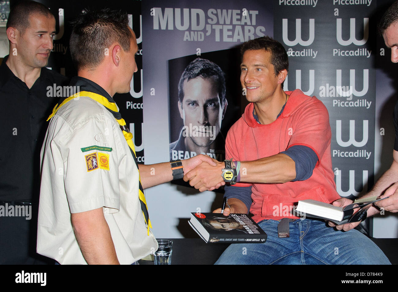 Bear Grylls TV survival expert, signs copies of recent book 'Mud, Sweat ...