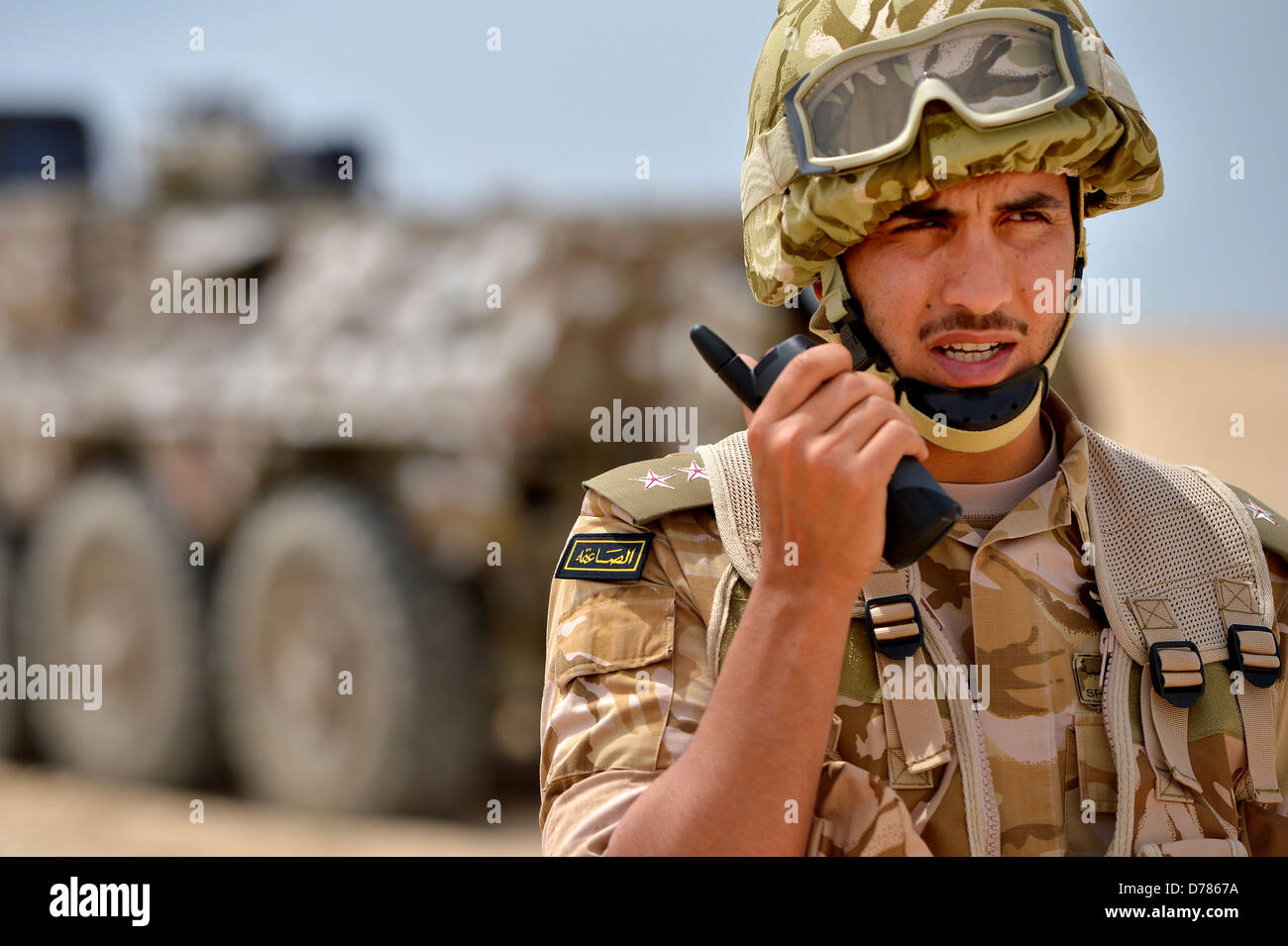 A Qatar Armed Forces soldier speaks on the radio to other members of ...