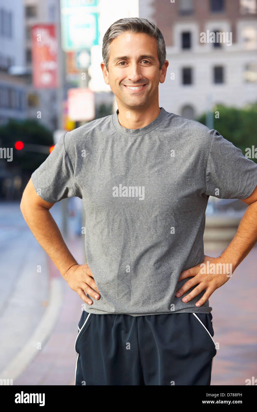 Portrait Of Male Runner On Urban Street Stock Photo - Alamy