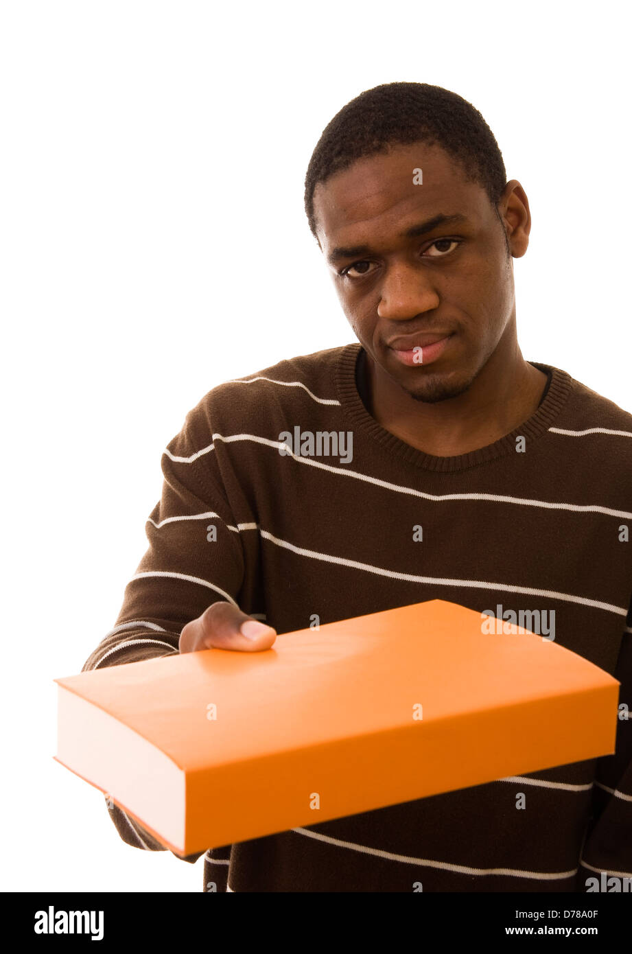 Young black man giving you a book Stock Photo - Alamy