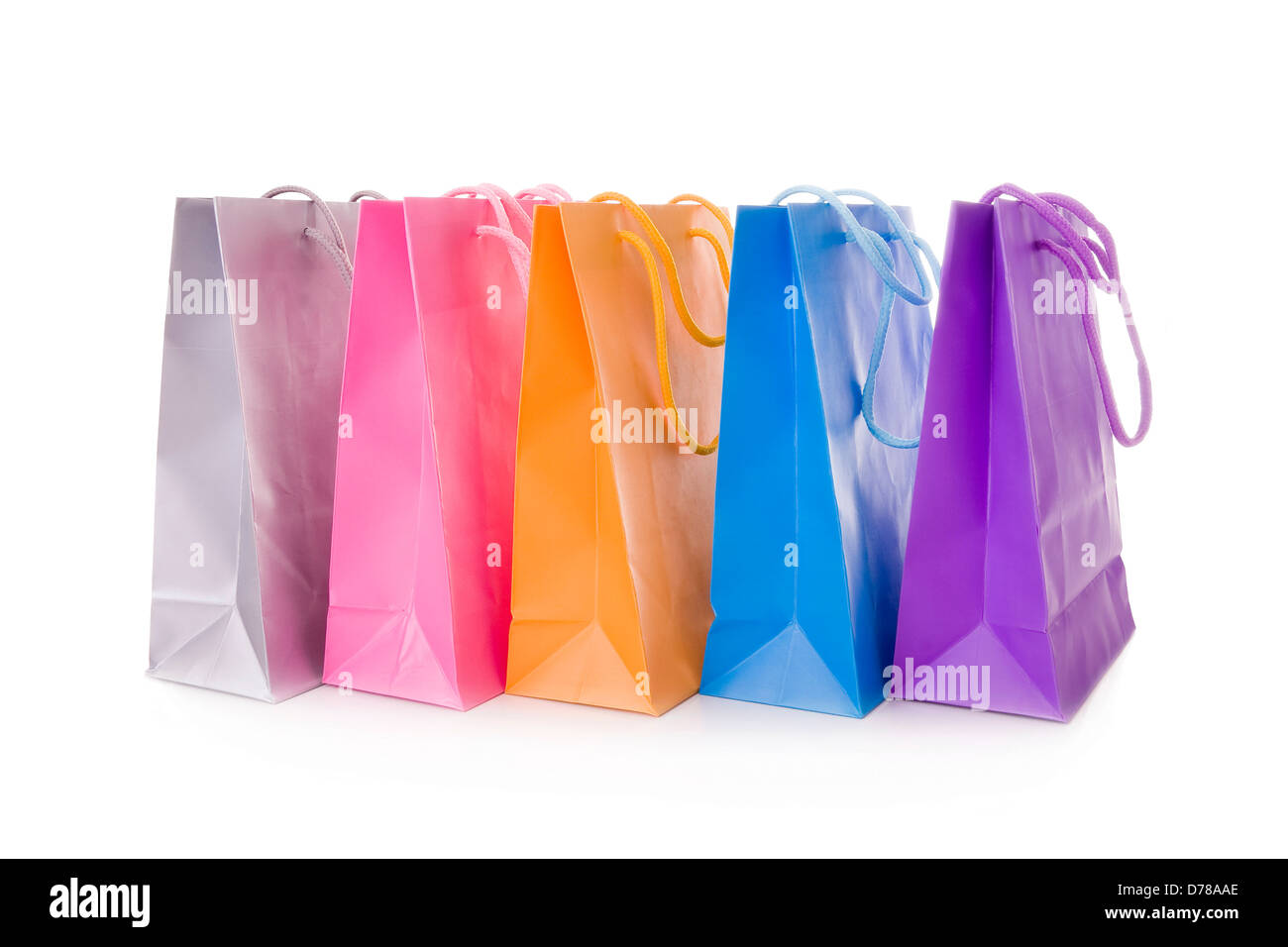 Five colorful shopping bags isolated on white Stock Photo - Alamy