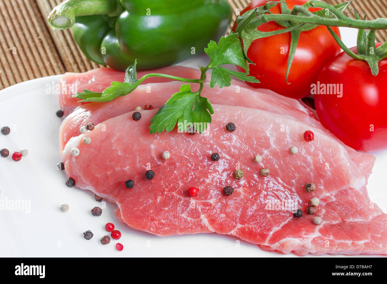 Raw meat with spices Stock Photo - Alamy