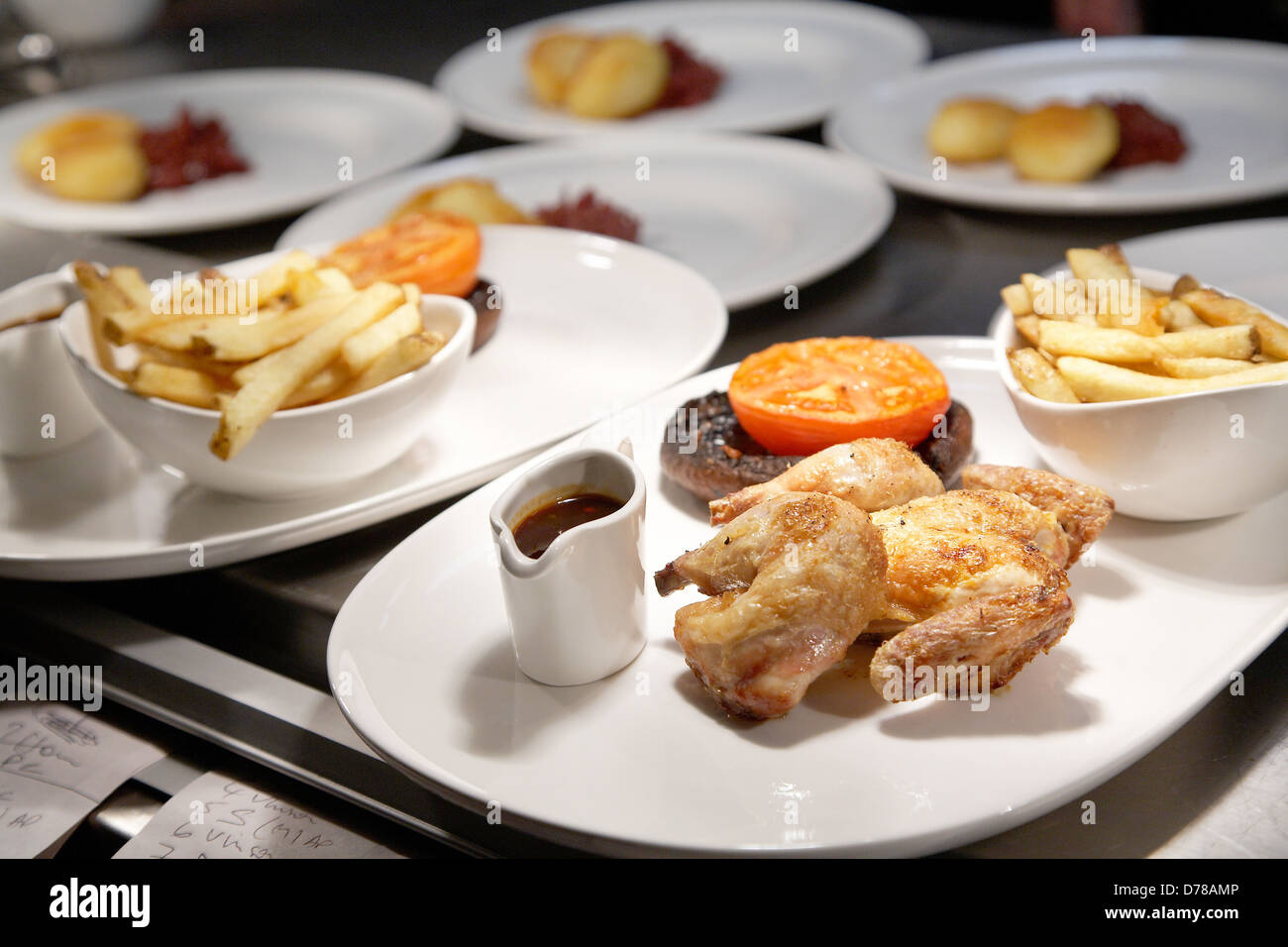 A small roast chicken ( poussin ) with fries, field mushroom, grilled ...