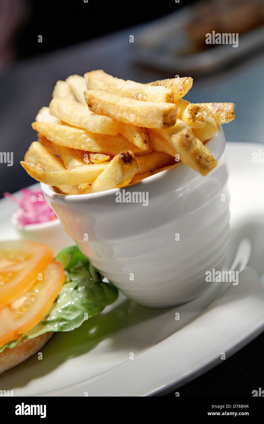 Bowl of chips served in a restaurant Stock Photo - Alamy