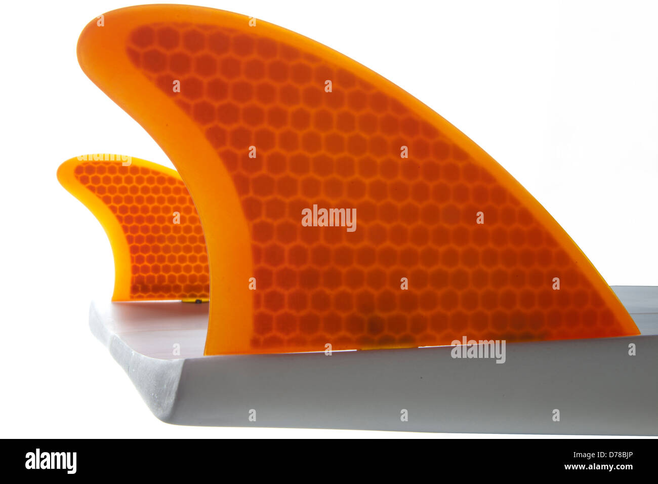 Surfboard fins on white background Stock Photo - Alamy
