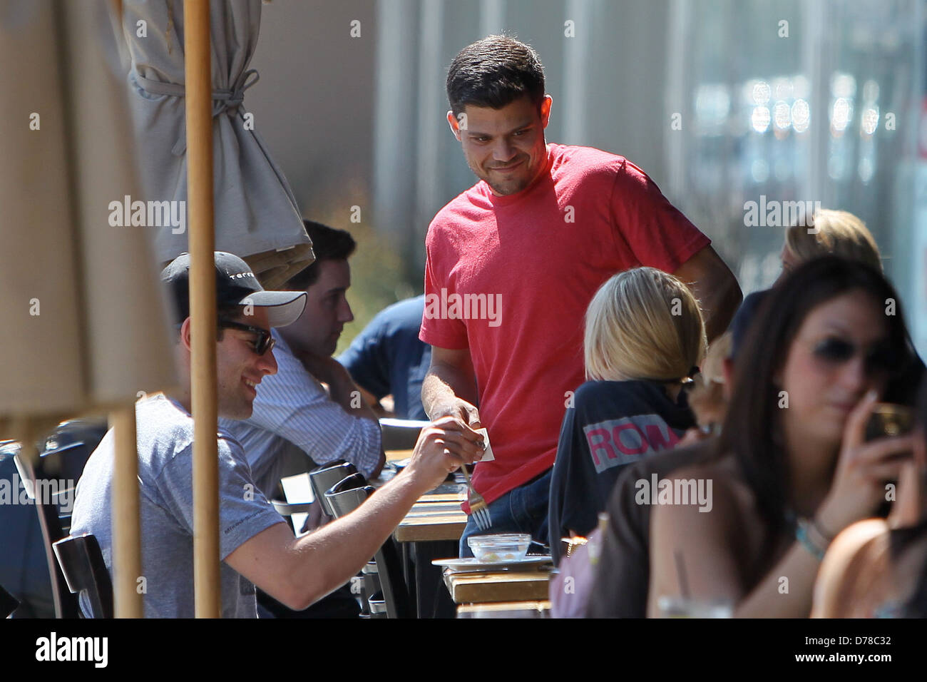Jerry Ferrara (C.) and friends leaving Toast restaurant in West ...