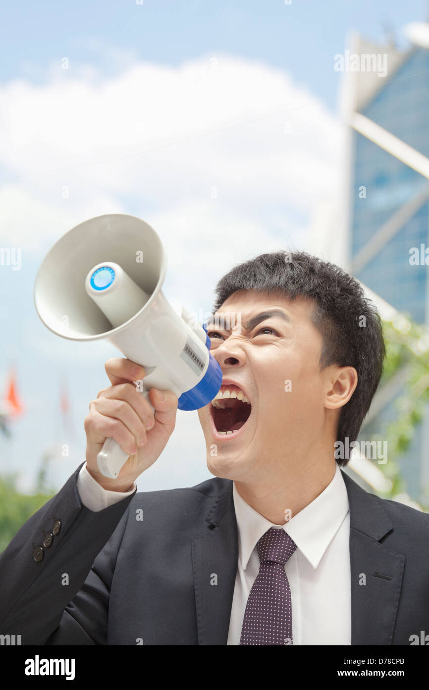 Standing holding communication megaphone authority hi-res stock ...