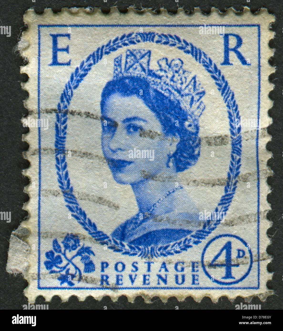A stamp printed in UK shows image of Elizabeth II is the constitutional ...