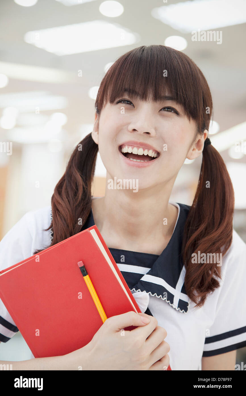 Girl with Notepad Stock Photo - Alamy