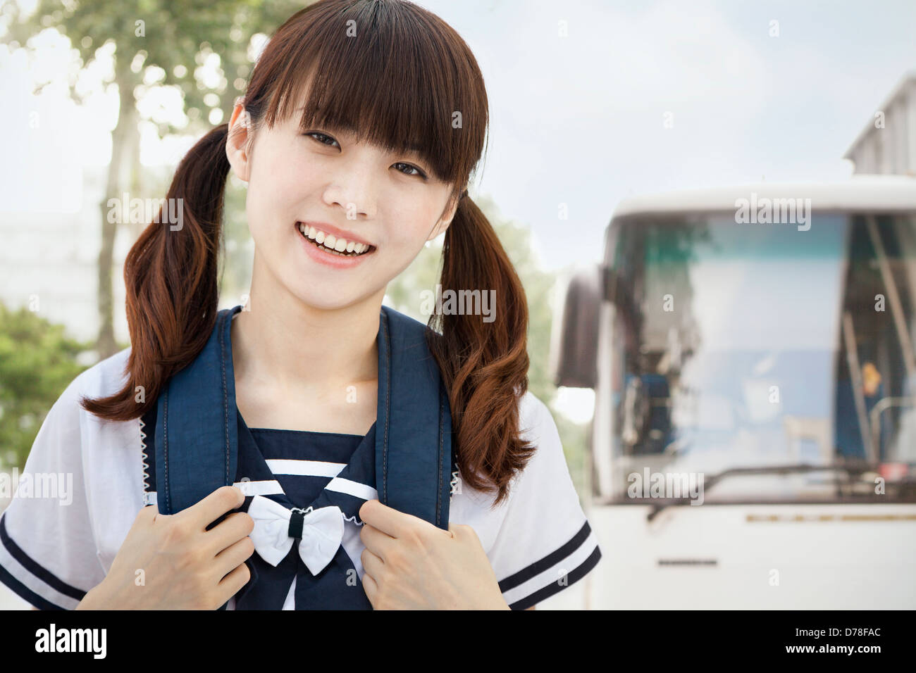 Girl Commuting to School Stock Photo - Alamy