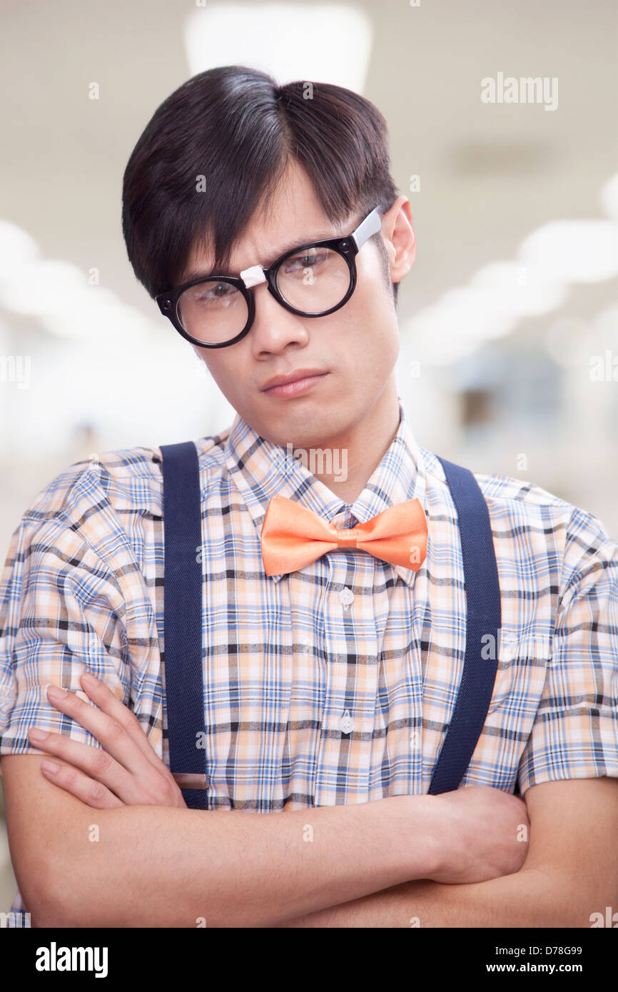 Curious Young Man with Glasses Stock Photo - Alamy