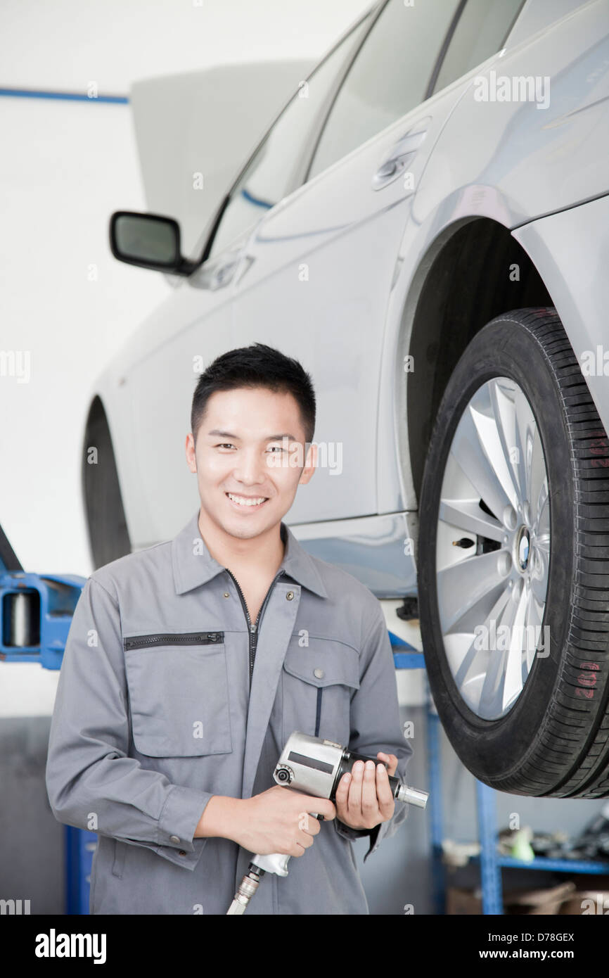 Portrait of Mechanic with Power Tool Stock Photo - Alamy