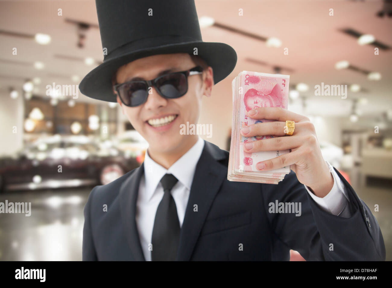 Rich Man Showing Off His Money Stock Photo - Alamy