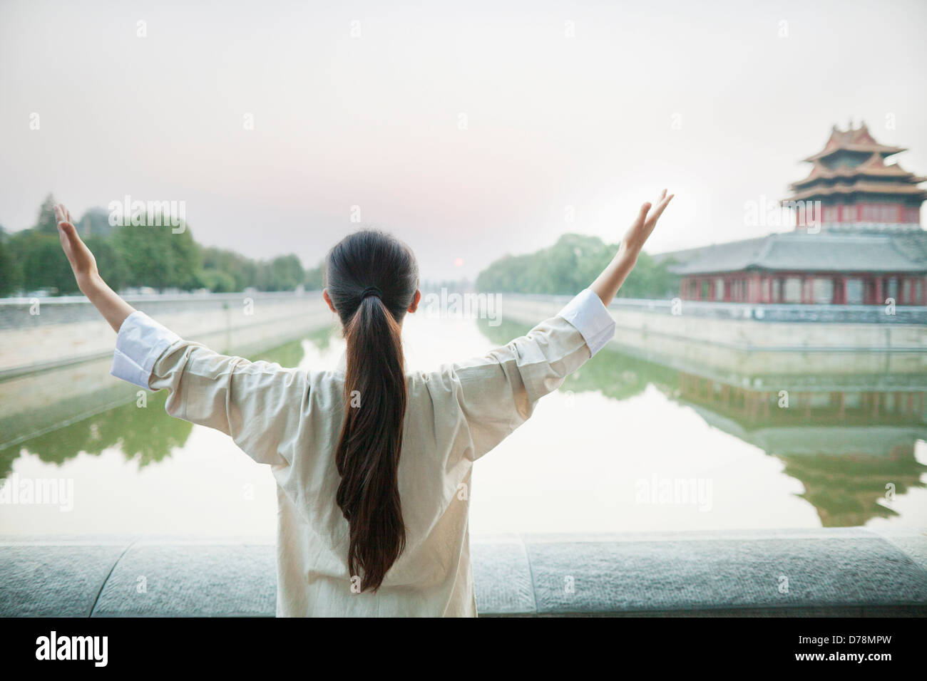 Young Woman Practicing Tai Ji Stock Photo - Alamy