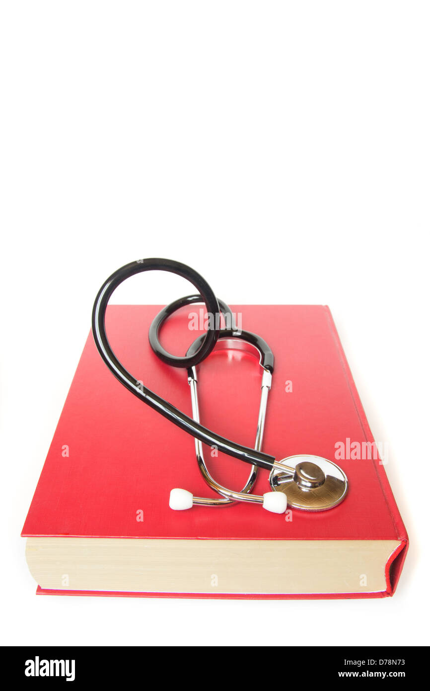 stethoscope and book close up isolated on white background. Medical ...