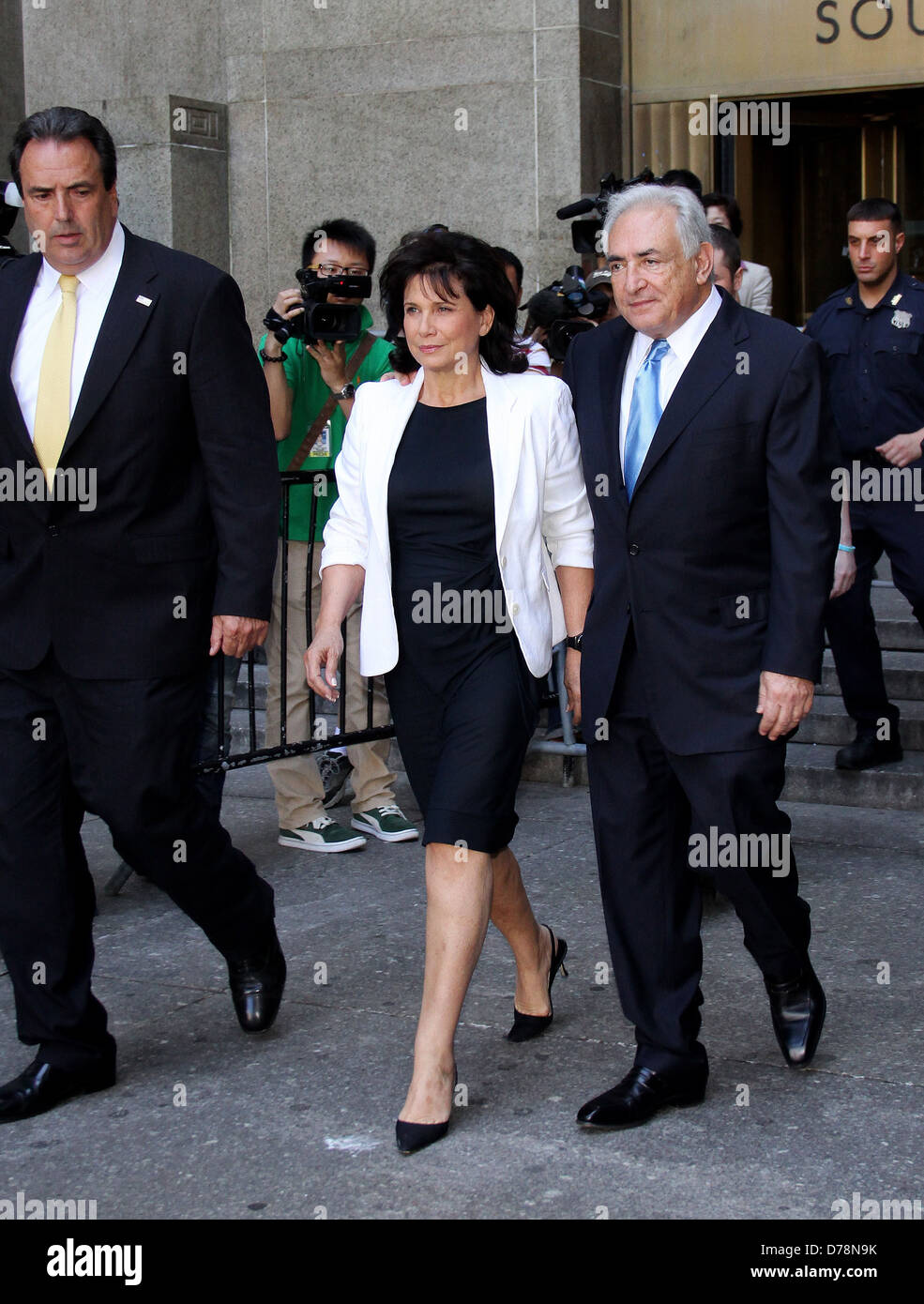 Dominique Strauss-Kahn and his wife Anne Sinclair arriving at criminal ...