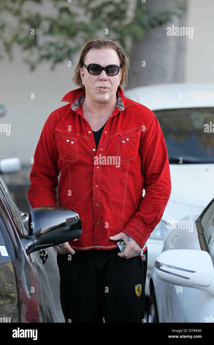 Mickey Rourke exits Cafe Roma in Beverly Hills wearing a red jacket and ...